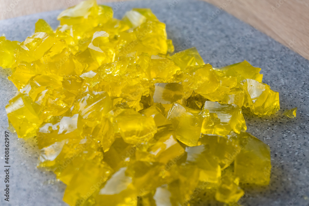 bright yellow sweet jelly. berry sweet pieces of clean jelly isolated ...