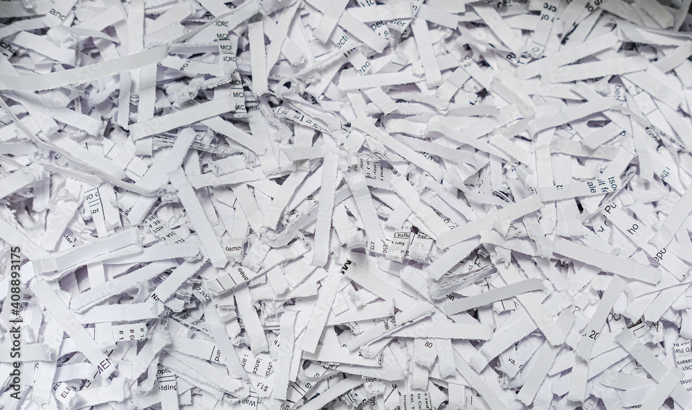 Strips of Shredded Paper from a Paper shredder for background or ...