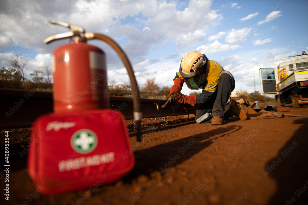 Safe work practices worker wearing PPE conducting hot work oxy cutting ...