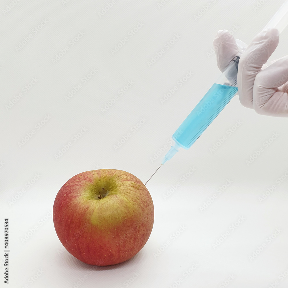 GMO Fruit(Plant) is injected with vaccine using biotechnology. Stock ...