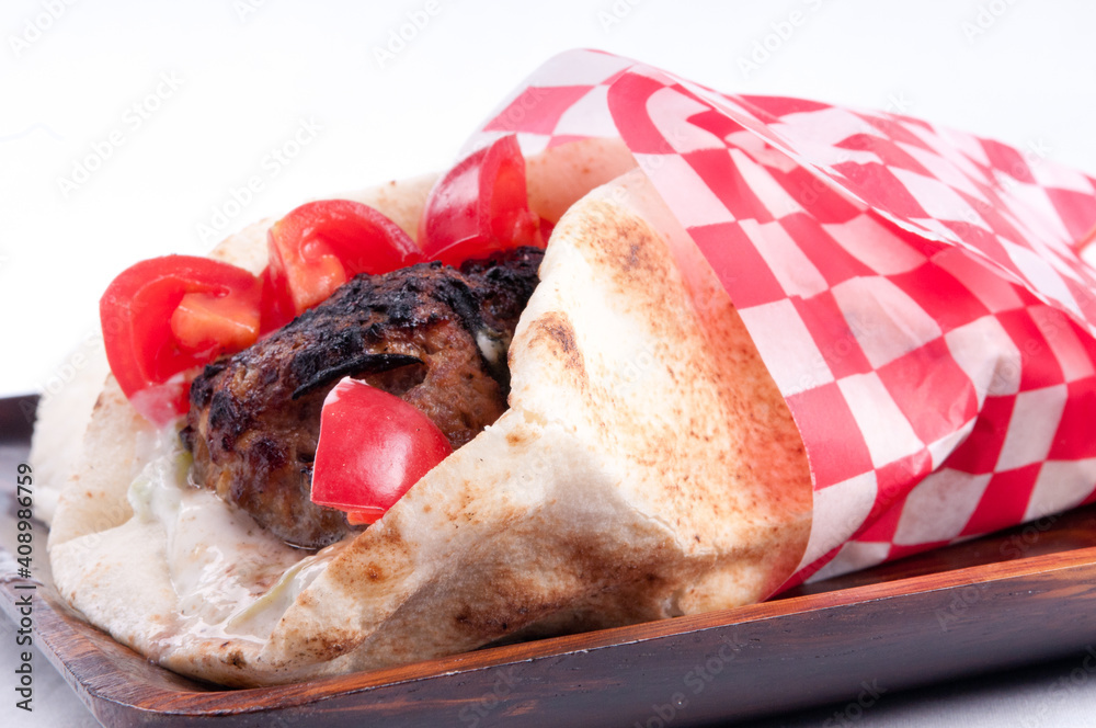 lean ground lamb gyro with rice and peas Stock Photo | Adobe Stock