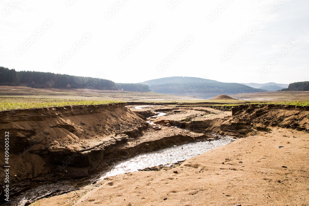 Empty river. Drought land texture, summers dry, cracked soil, ground on ...