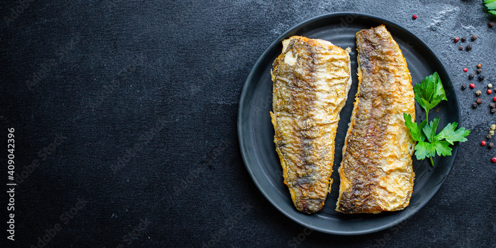hake fried fish fresh seafood second course portion on the table for ...