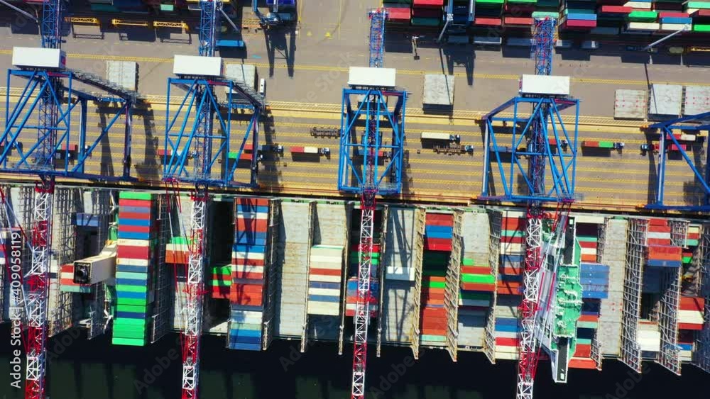 Container ship loading at port with crane, container ship carrying ...