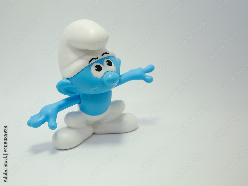 The smurfs. Little blue creatures that live in mushroom houses in the ...