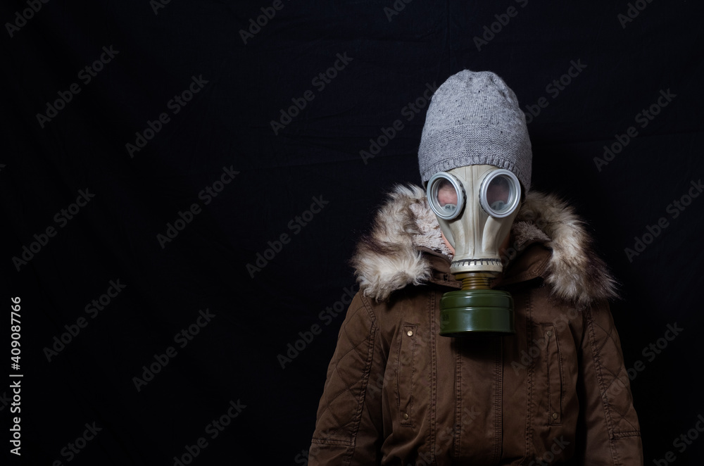 Woman in coat and mask looking sad Stock Photo | Adobe Stock