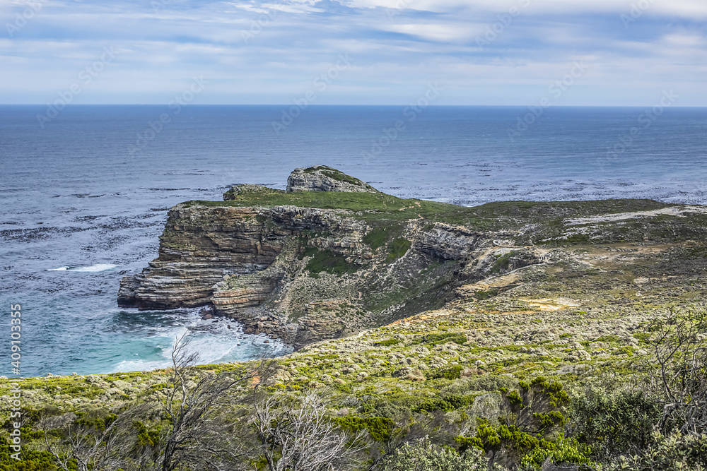 Rugged rocks and steep cliffs of Cape Point in the Cape of Good Hope ...