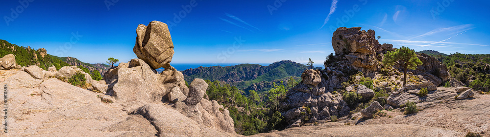 Balanced rock "Rocher Sentinelle" on a plateau above the Alta Rocca ...