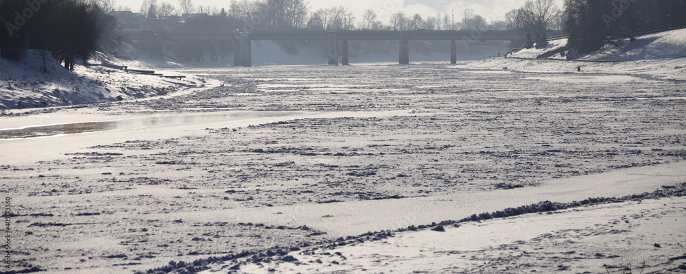 Beautiful frozen river panoramic landscape with iced water riverbed ...