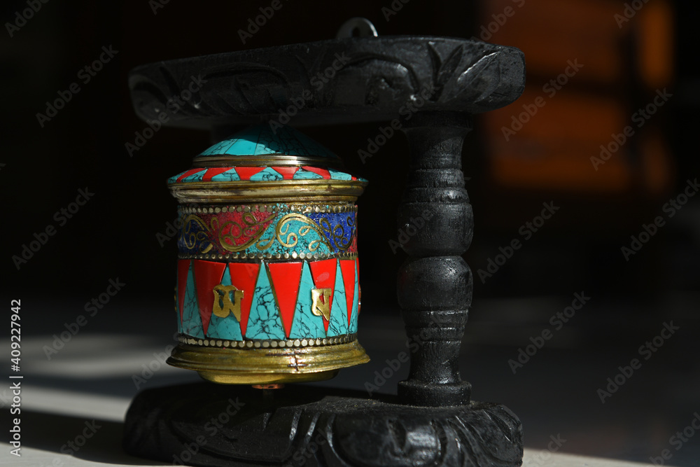 Buddhist Dharma chakra made in Nepal , in static form. The spinning of ...