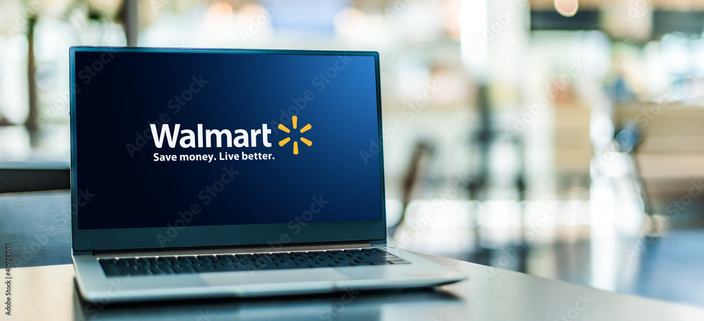 Laptop computer displaying logo of Walmart Stock Photo | Adobe Stock