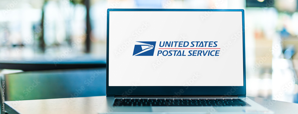 Laptop displaying logo of The United States Postal Service Stock Photo ...