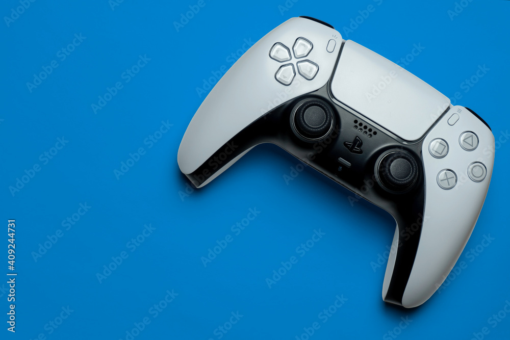 Next-Gen Sony PlayStation 5 dualsense video game controller on blue ...