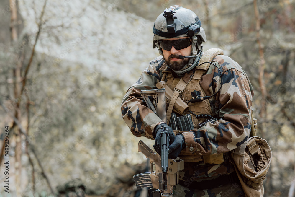 Portrait of a middle-aged bearded soldier in a Woodland military ...