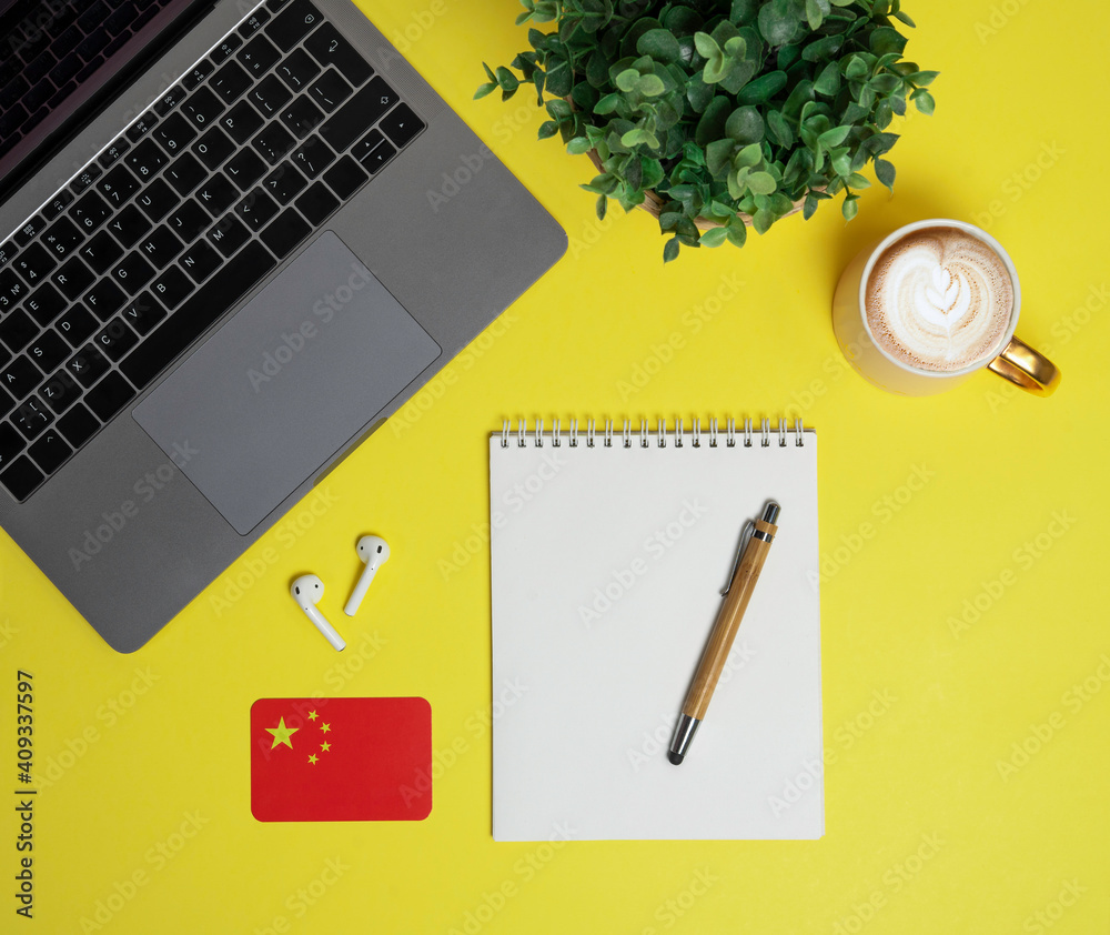 online Chinese language course moke up. Layout of laptop, headphones ...