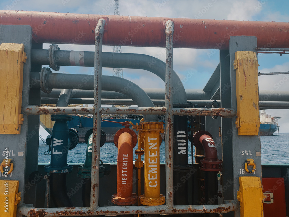 Offshore ship cargo manifolds ready to offload cargo to Floating ...