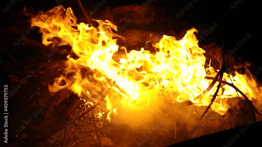 Slow motion shot of Bonfire with sparks flying around, Night campfire ...