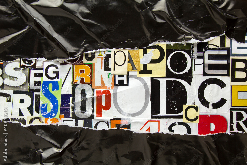 Torn and crumpled black paper on collage from clippings with newspaper ...