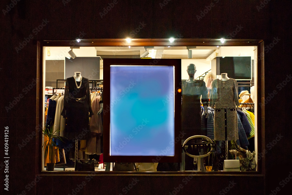 Banner for advertising in a shop window. Clothing store window. Sign ...