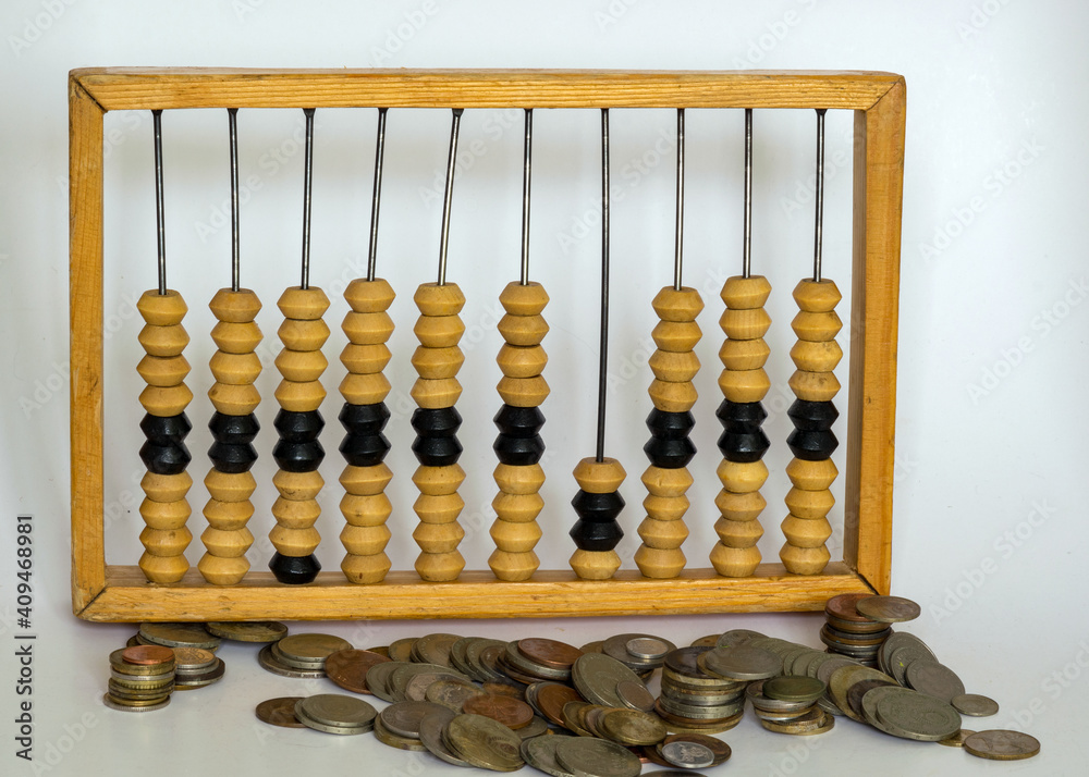 various shapes, countries and values of old metal coins, against the ...