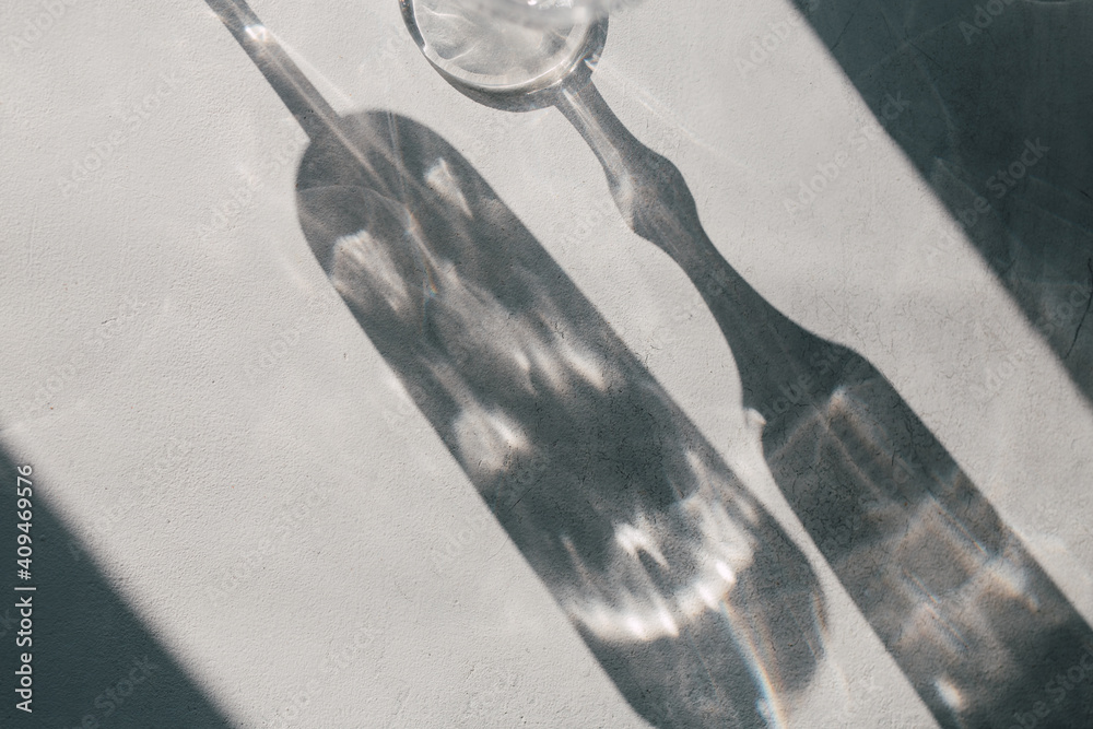Crystal glasses for wine in the sunshine, with light passing through ...