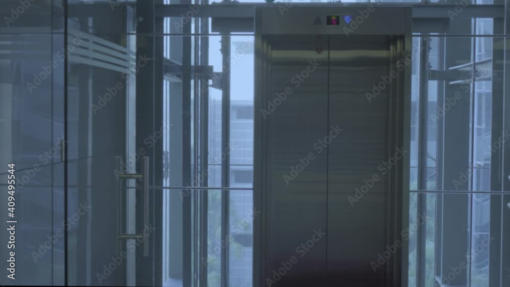 Elevator moving from the eighth floor to the fourth floor. Then the ...