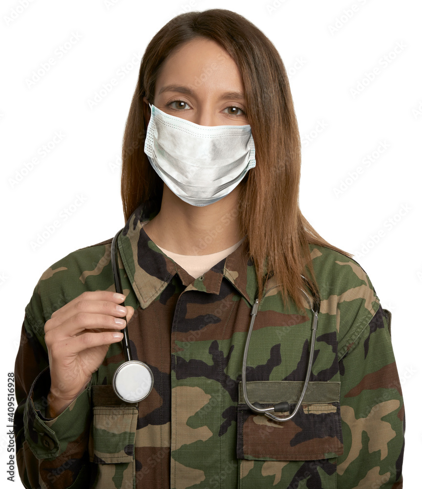 Military female doctor wearing camouflage fatigues, surgical mask with ...
