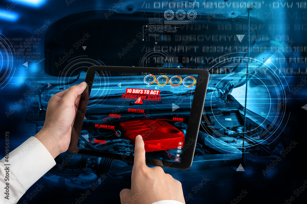 Engineer use augmented reality software to monitor parts of car vehicle ...