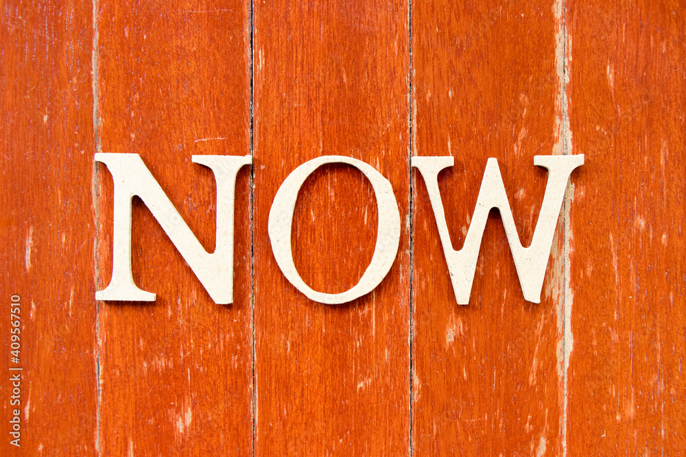 Alphabet letter in word now on old red color wood plate background ...