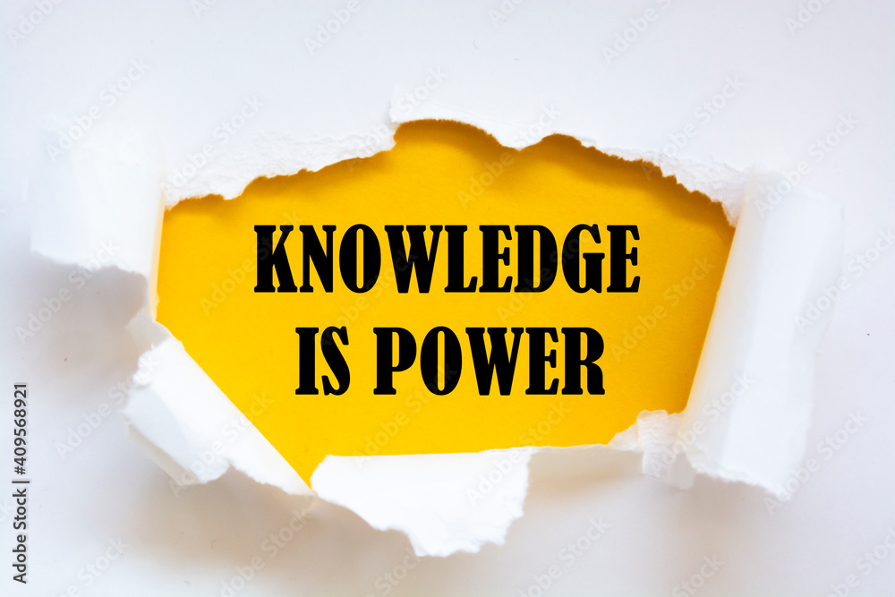 Text Knowledge is power appearing behind ripped white paper Stock ...