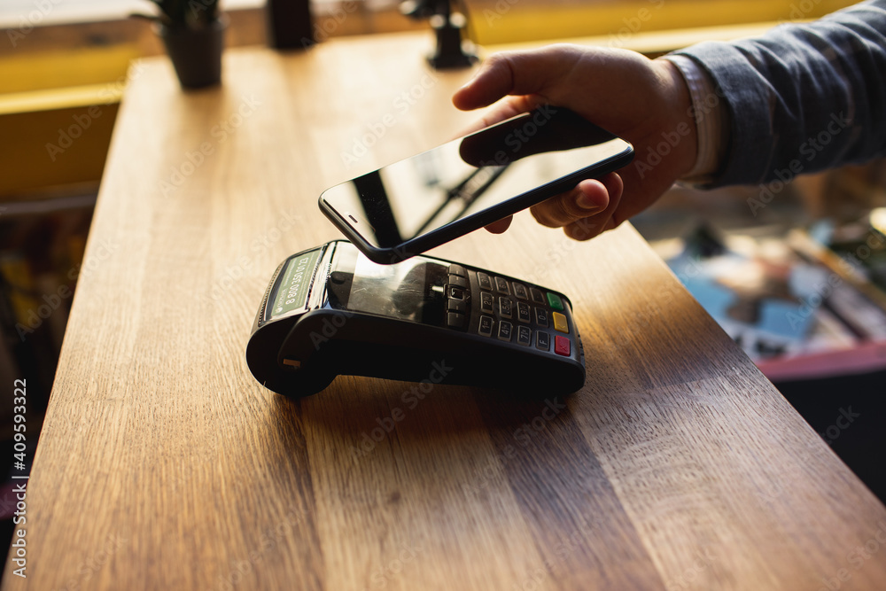 Contactless payment with your smartphone. Paying with a smartphone ...
