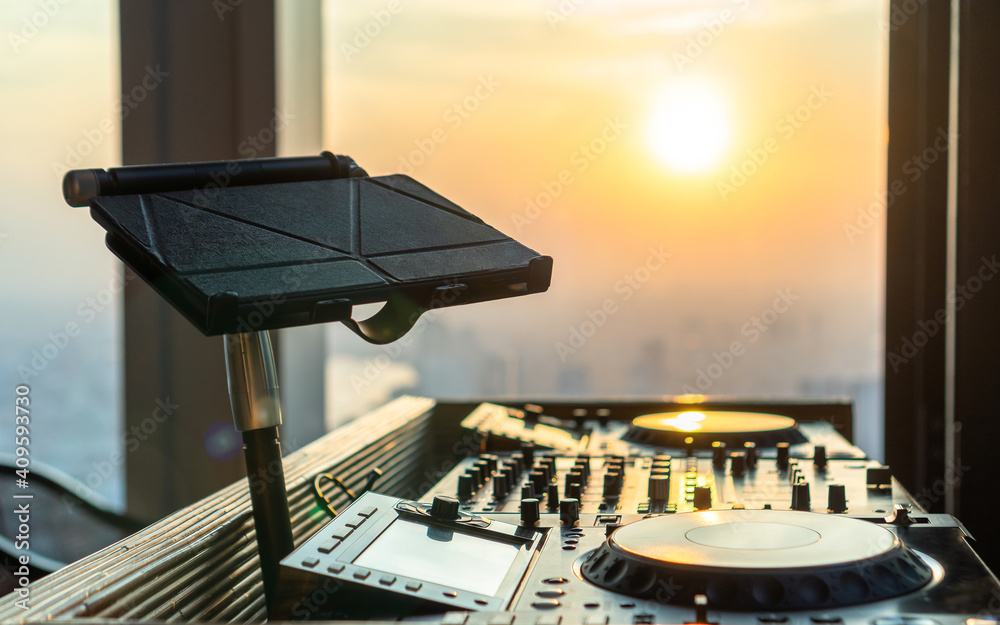 Disc Jockey controller for DJ disc jocker for rooftop dinner restaurant ...