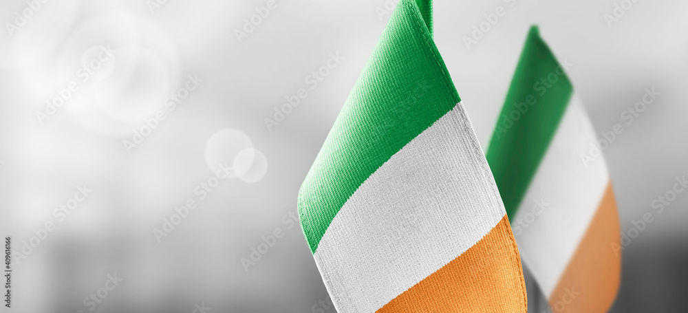 Small national flags of the Ireland on a light blurry background Stock ...