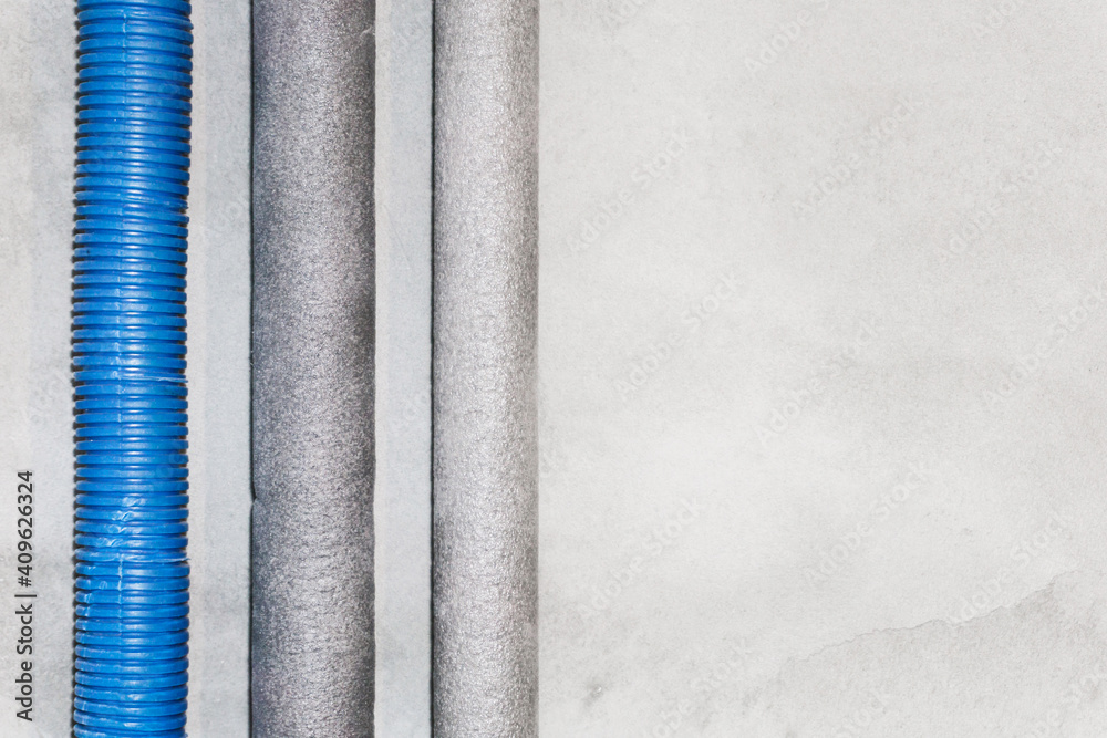 Water plumbing system background. Hot water pipes in thermal isolation ...