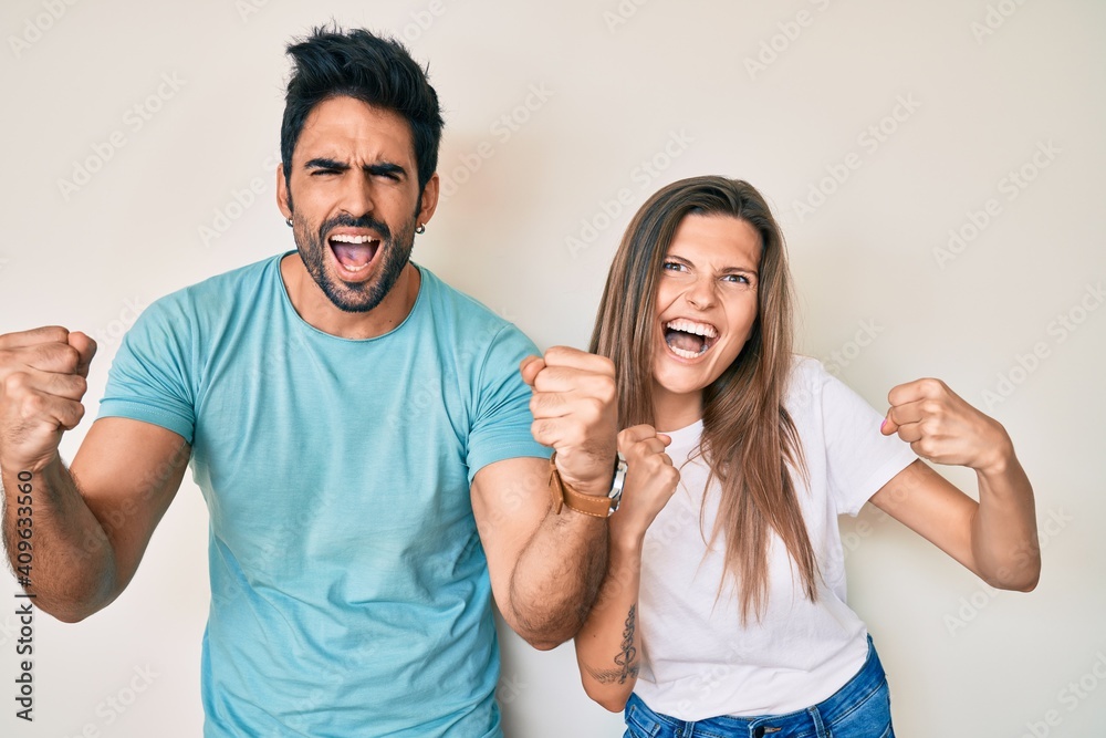 Beautiful young couple of boyfriend and girlfriend together angry and ...