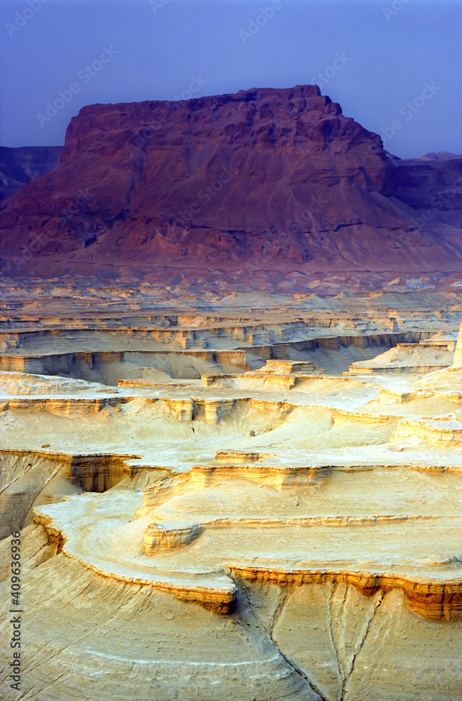 Colorful rock formations near Masada, ancient Jewish fortress in Judean ...
