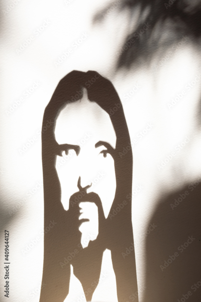 Face of Jesus Crist in shadow on the wall, christian religion symbol ...