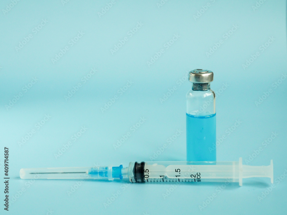 Vaccine and syringe injection. Vials medicine bottles. Laboratory ...