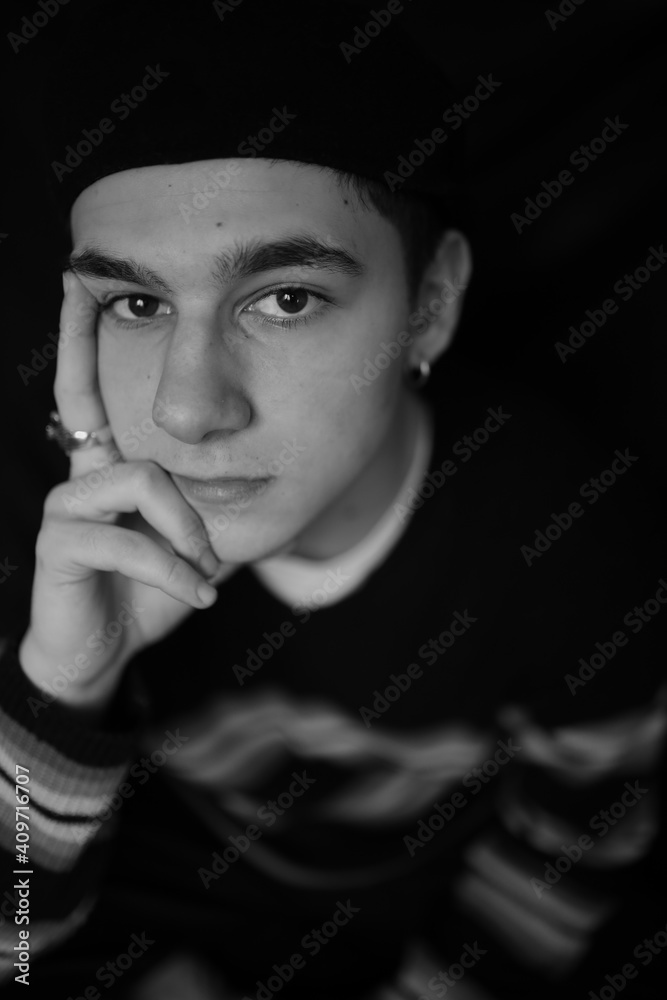 black and white portrait of a young guy. Good guy. A guy of European ...