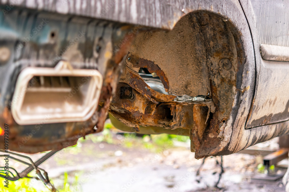The rusty old interior of the car is not restored. The car body after ...