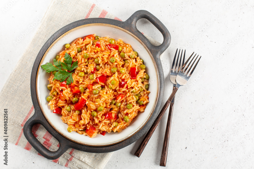 Djuvec rice - traditional balkan dish. Rice cooked with red bell pepper ...