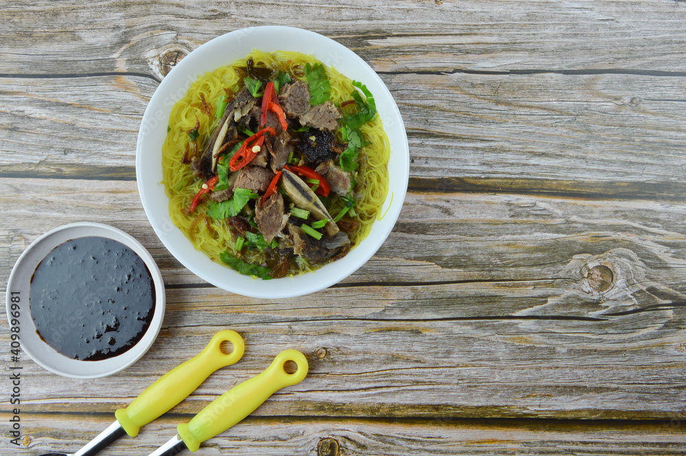 Beef soup with mee hoon or rice vermicelli or bee hoon with soy sauce ...