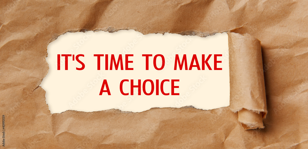 Text - It's time to make a choice - appearing behind torn brown paper ...
