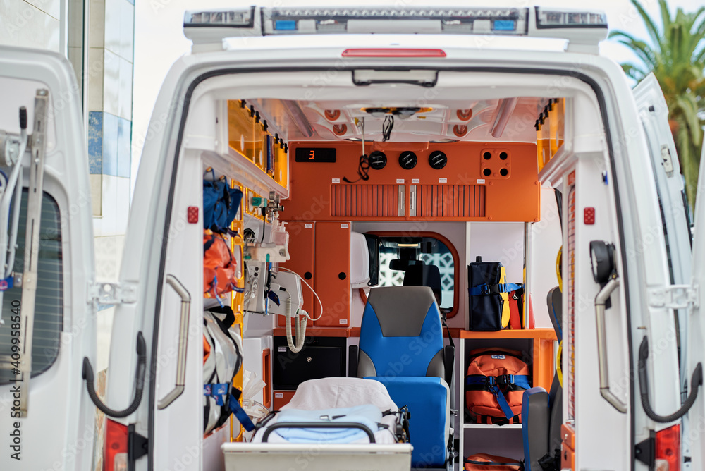 Interior of contemporary ambulance car equipped with various ...