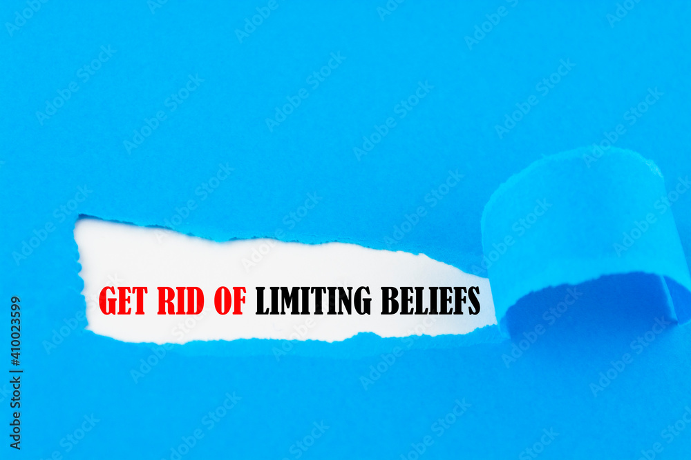 GET RID OF LIMITING BELIEFS, TEXT on white paper with torn paper ...