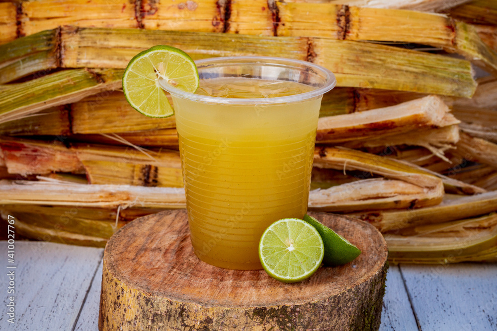 Sugarcane juice, guarapo de caña o jugo de caña de azucar. Stock Photo ... Sugarcane juice, guarapo de caña o jugo de caña de azucar. Stock Photo ...