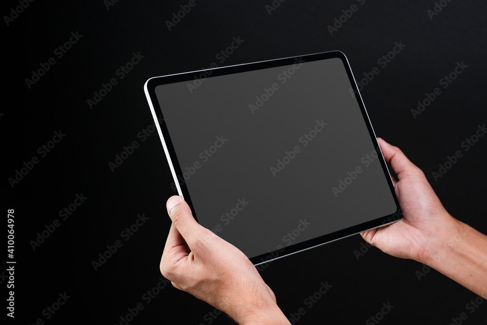 Hand holding digital tablet with blank black screen Stock Photo | Adobe ...