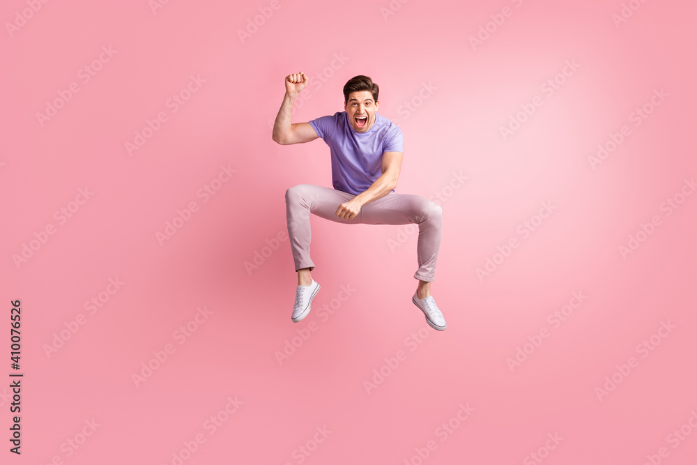 Full length body size photo of playful guy imagine riding horse wild ...