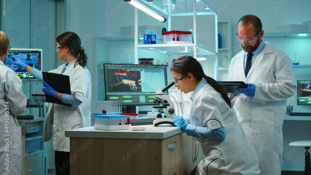 Team of biochemistry scientists developing drugs agains new virus ...