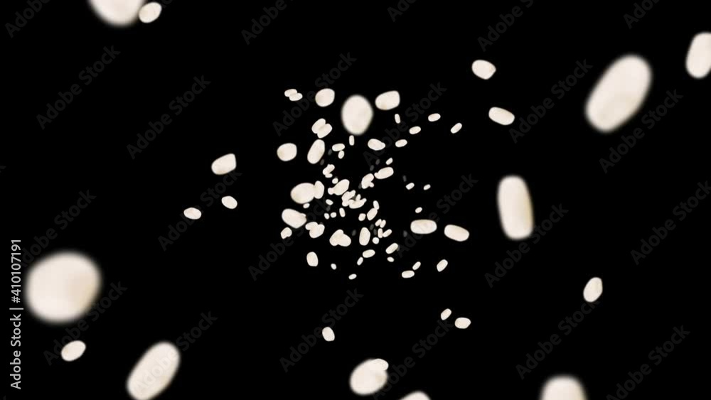 Flying many rice on black background. White rice grains. Glutinous rice ...